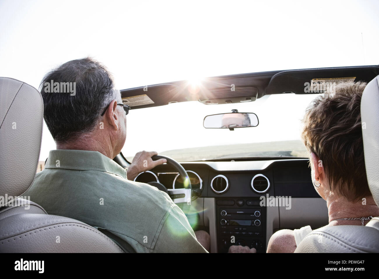 Driving a convertible from behind hi-res stock photography and images ...