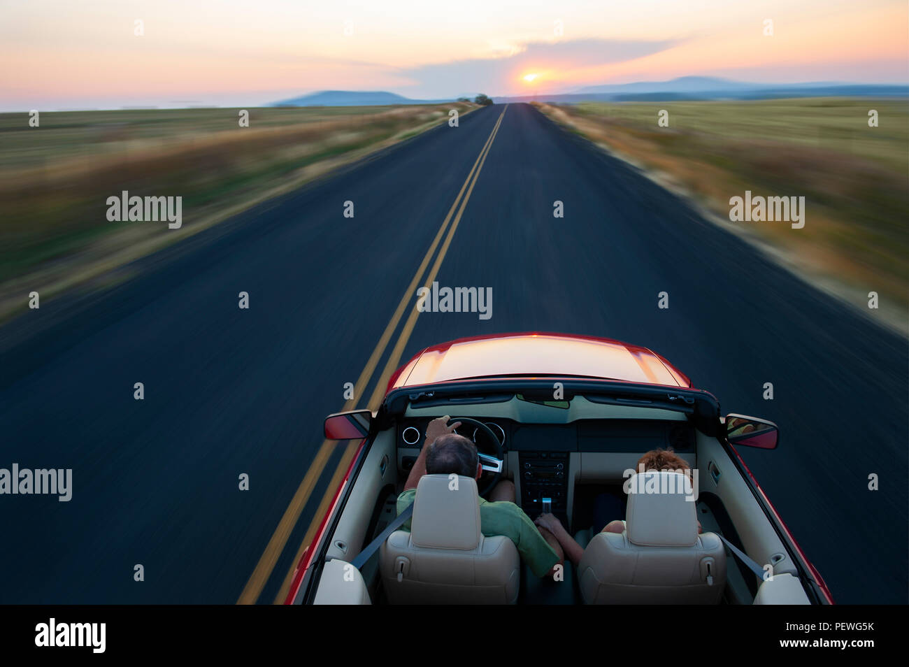 Driving a convertible from behind hi-res stock photography and images ...