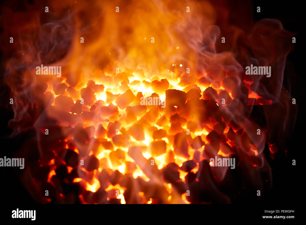 Red-hot glowing coals in a furnace Stock Photo - Alamy
