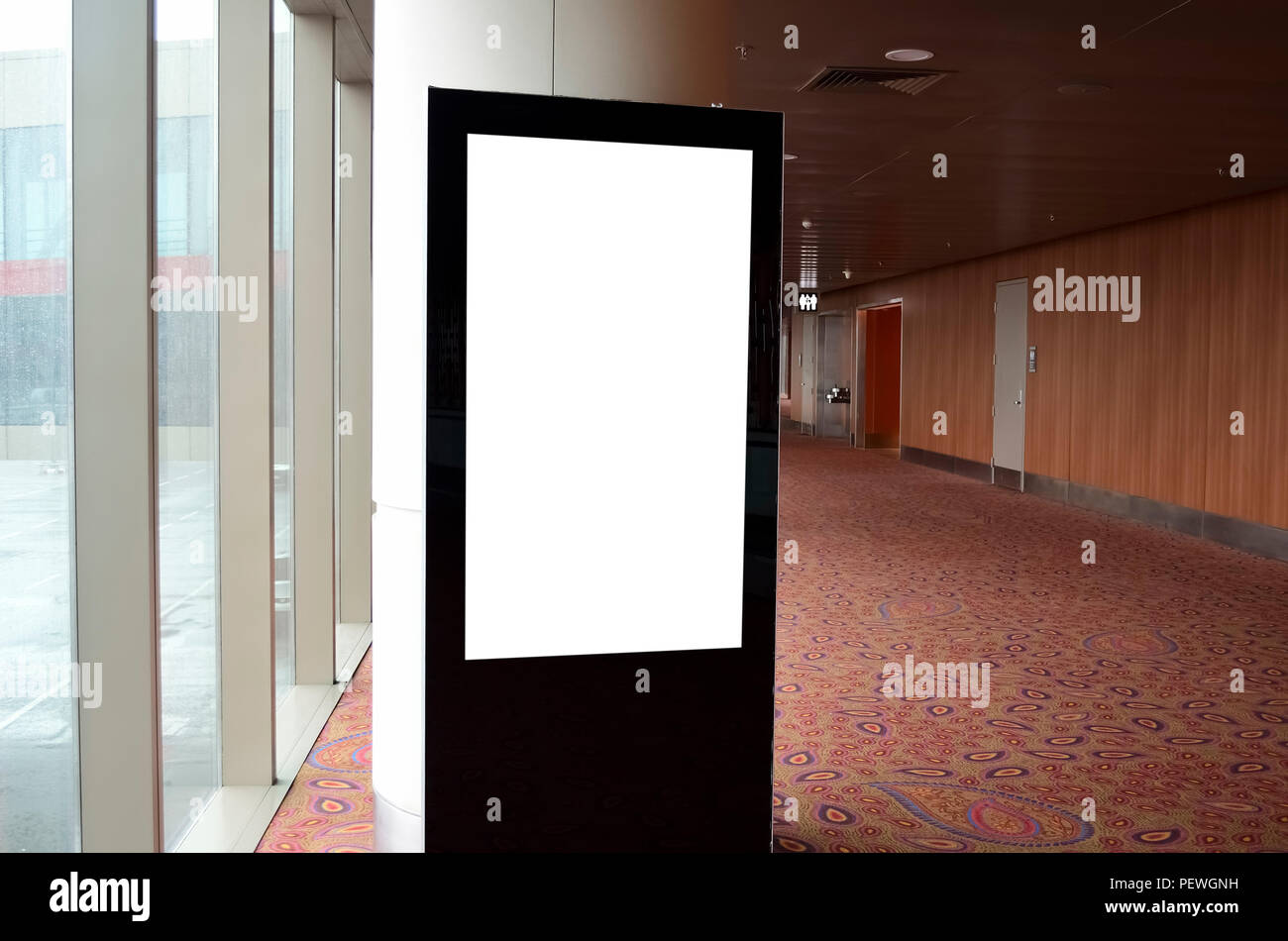 Billboard in a airport lobby Stock Photo - Alamy