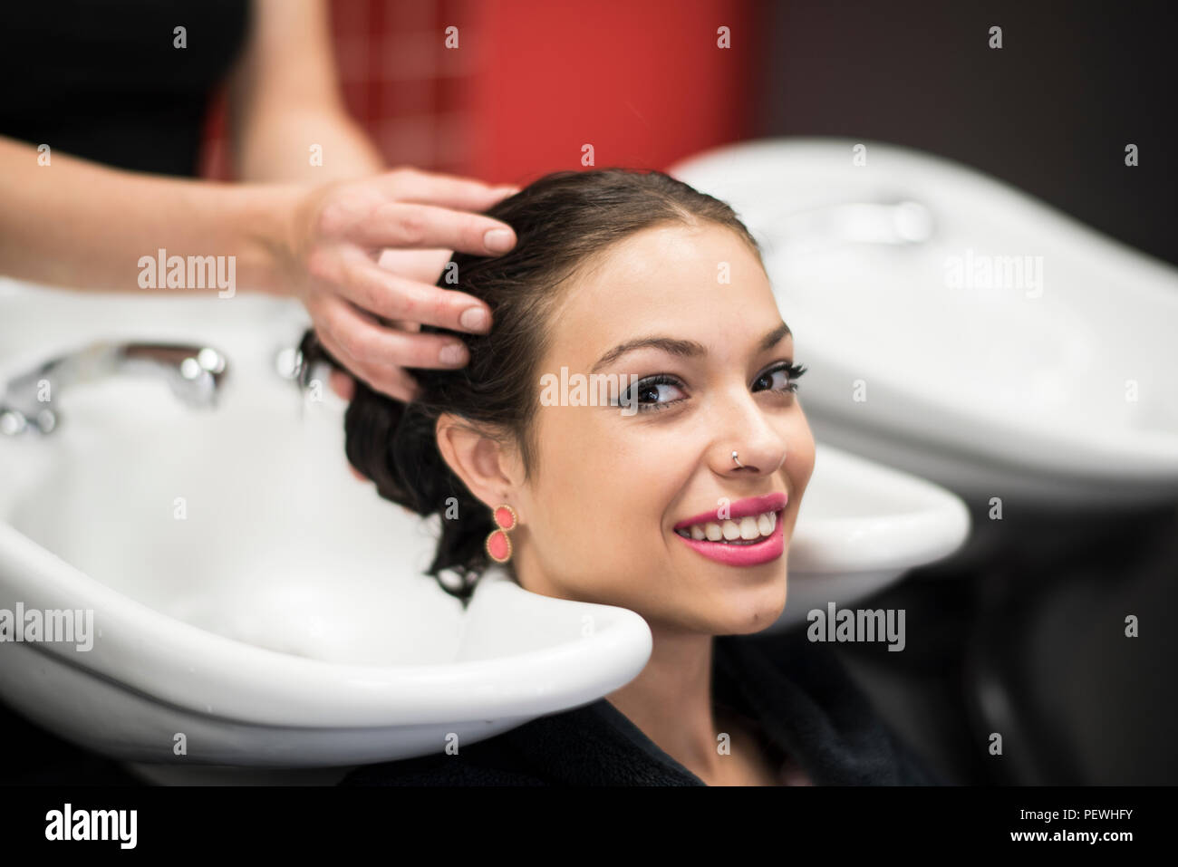 Old women salon washing hi-res stock photography and images - Alamy