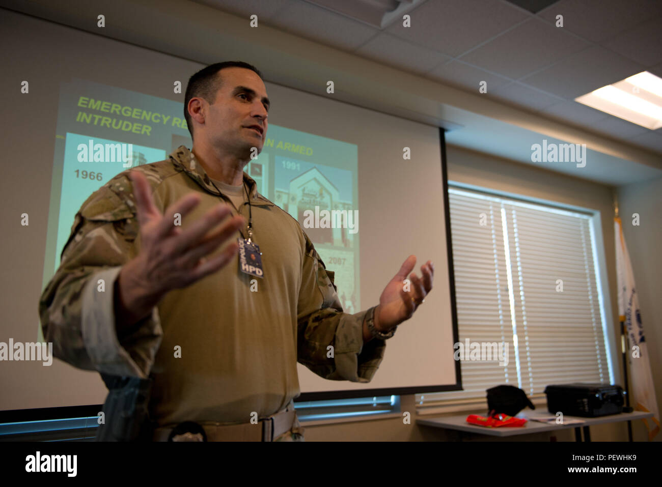 A Houston Police Department SWAT officer speaks to local law ...