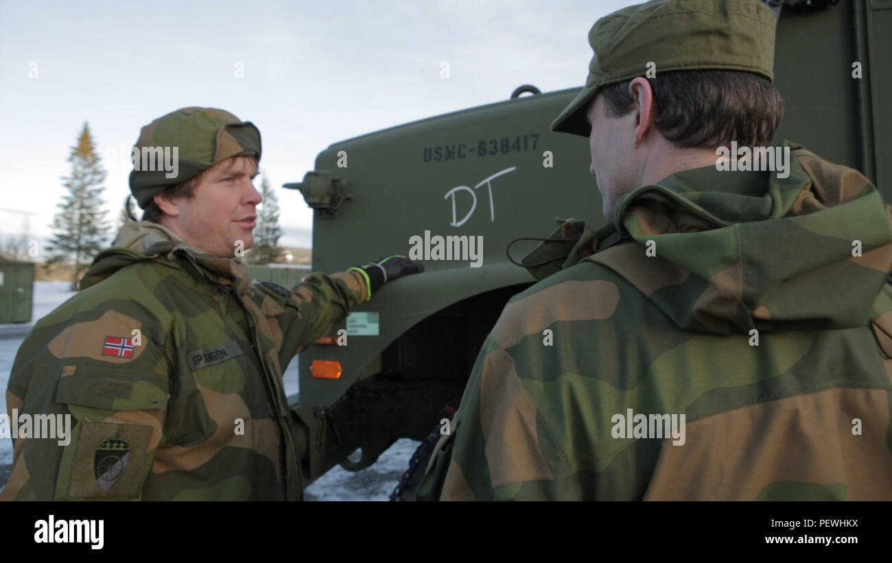 Norwegian soldiers help U.S. Marines get their tactical vehicles winter ...