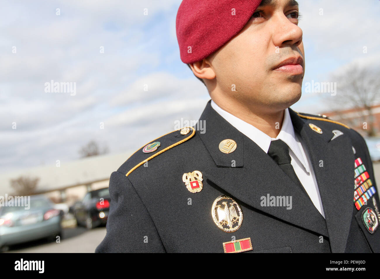 U.S. Army Staff Sgt. Enoch Fleites, a student in the 25Z Visual ...