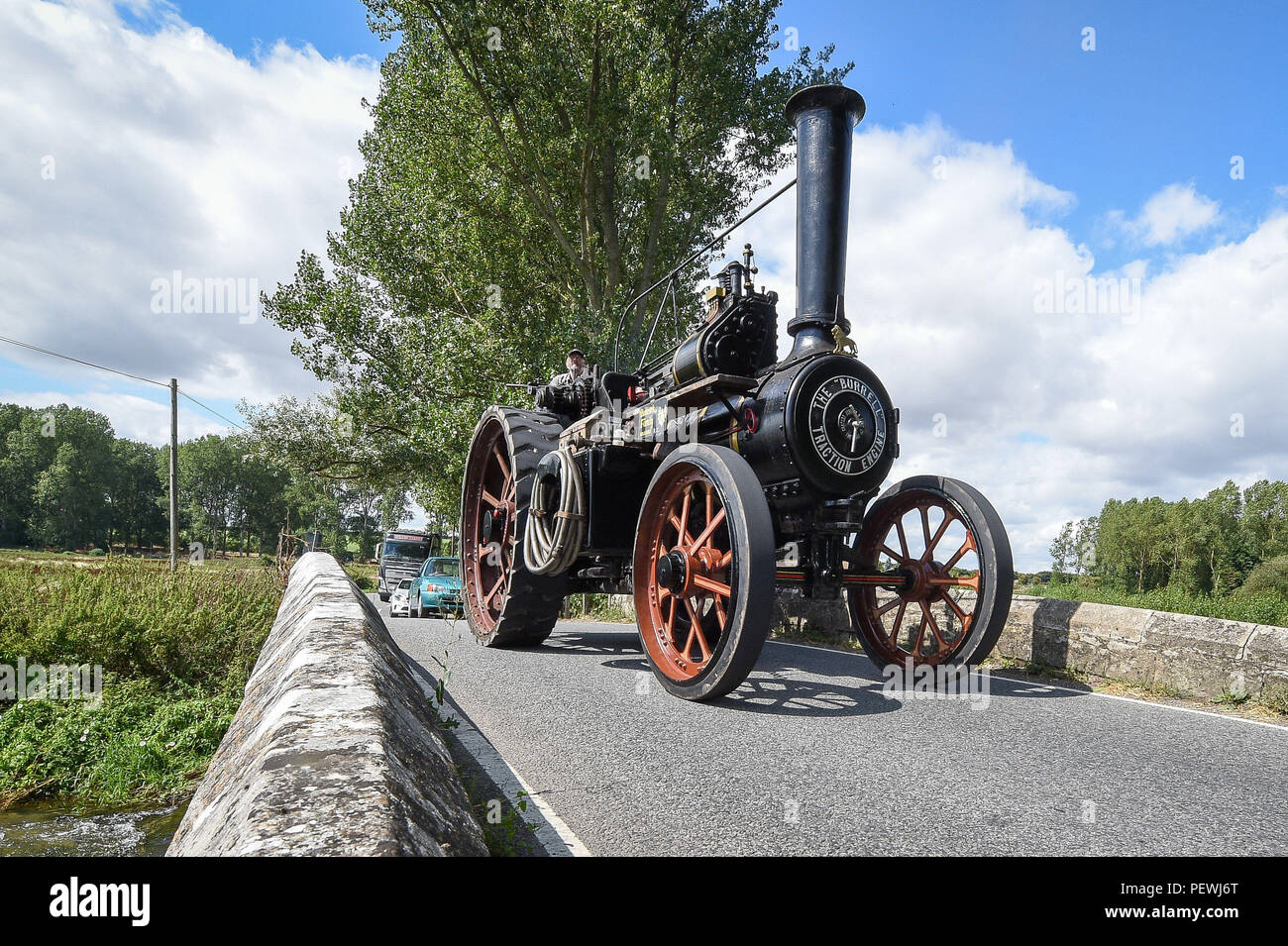 A Burrell Traction Engine makes its way over the River Allen near the ...
