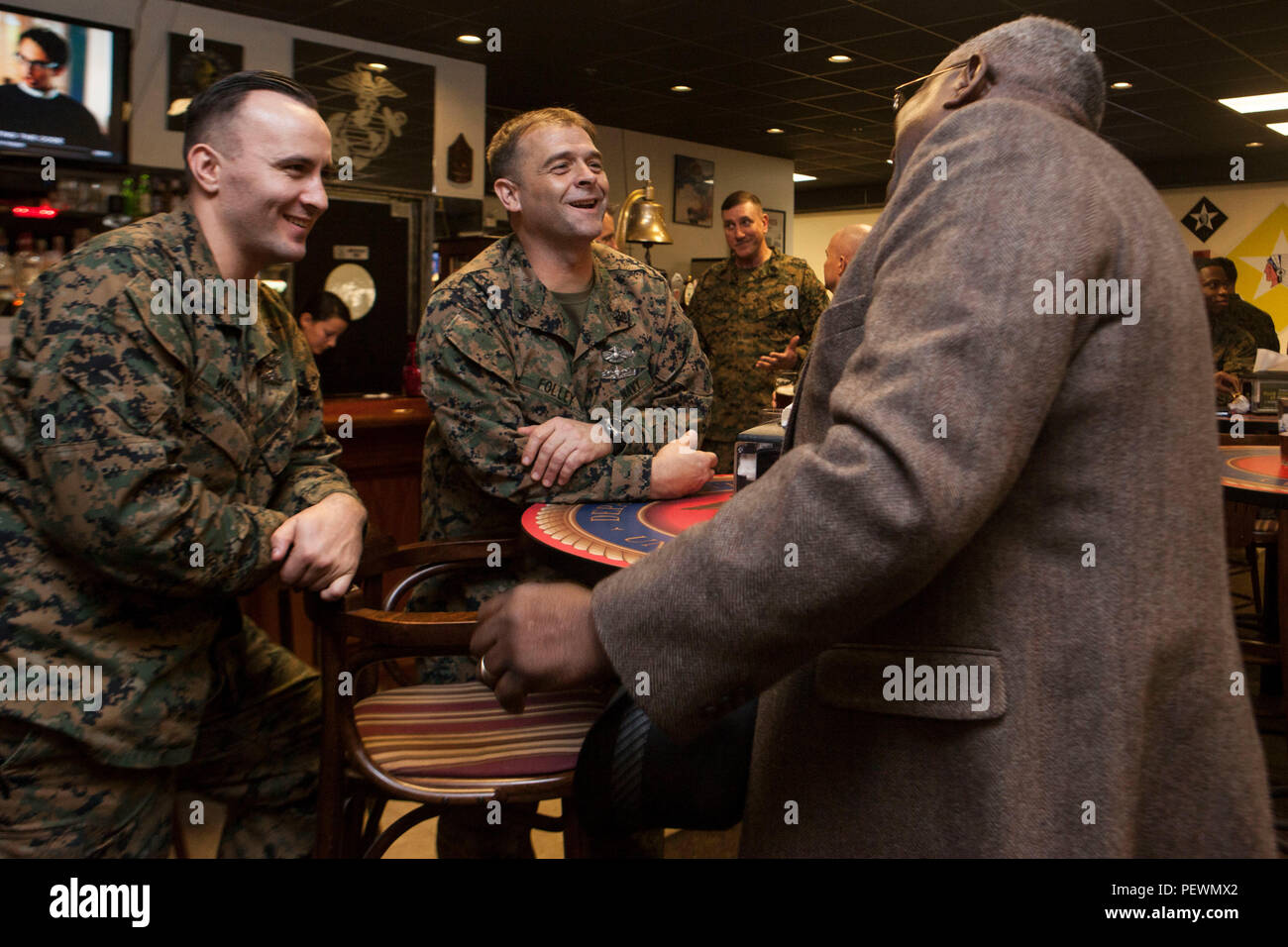 U.S. Marine Corps veteran Cpl. Jim Bennett, right, speaks with U.S ...