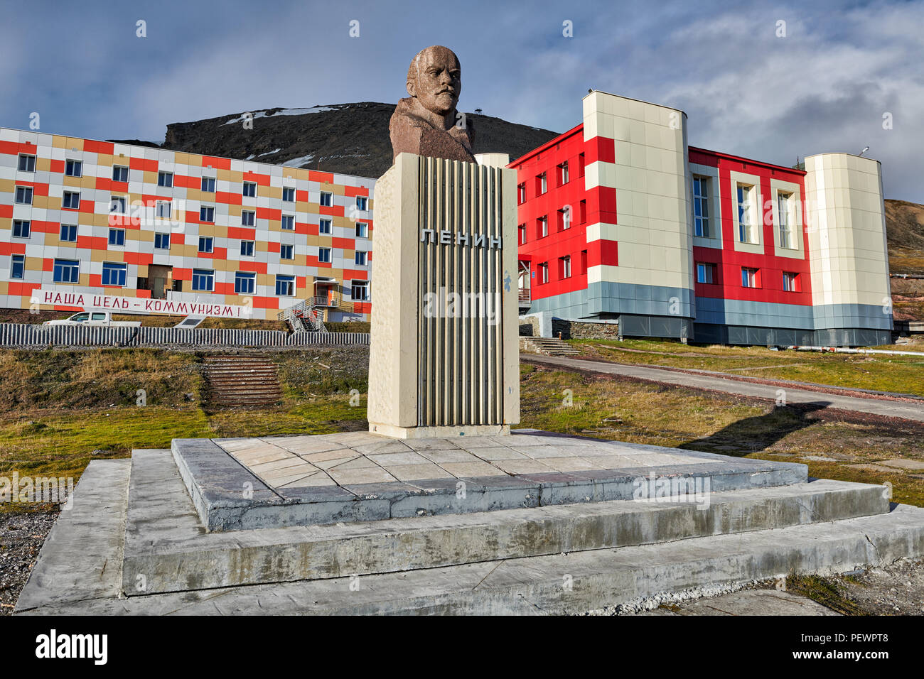 Lenin memorial in front of Concrete apartment blocks of russian mining ...