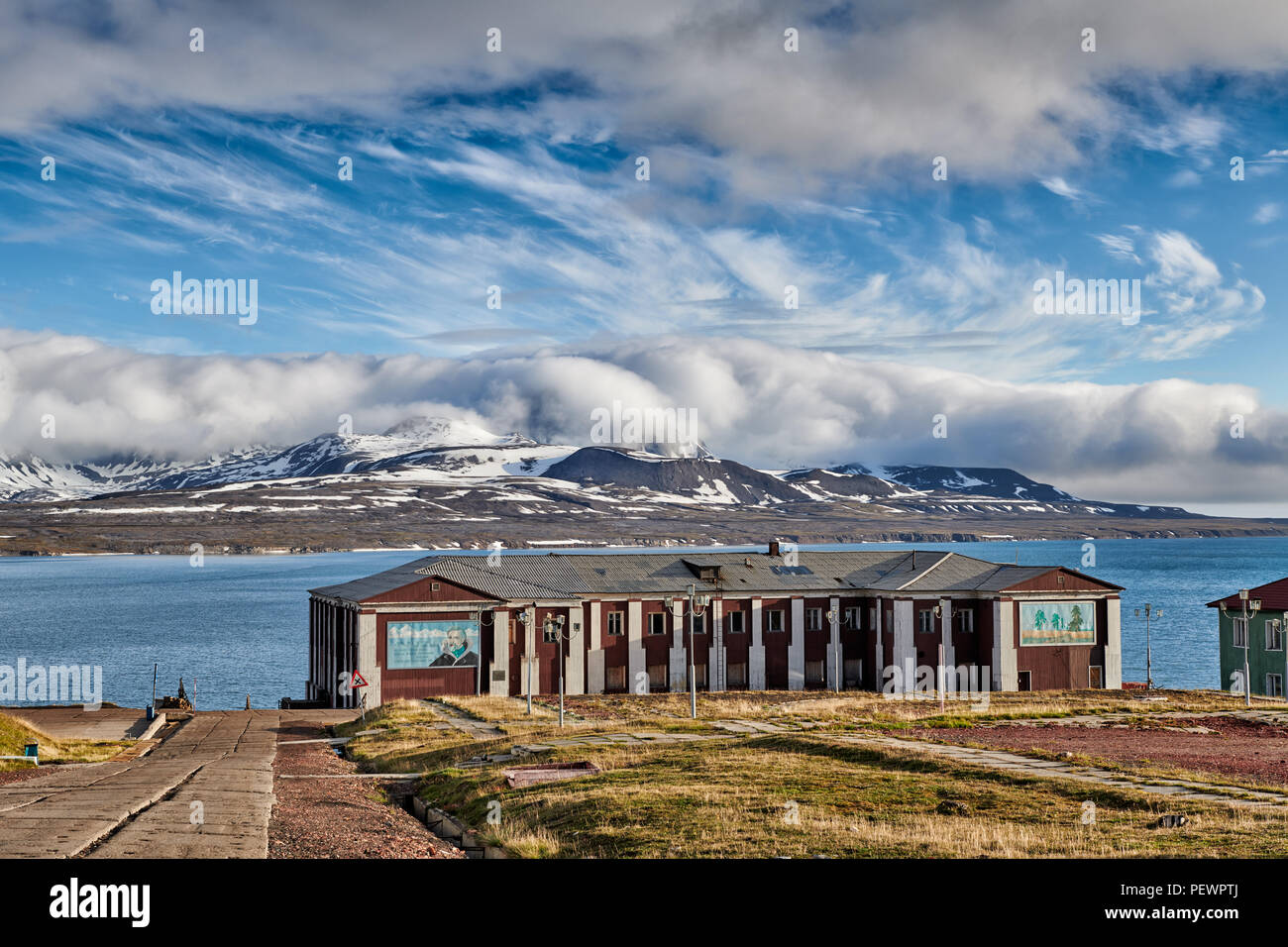 buildings of russian mining town Barentsburg in front of landscape ...