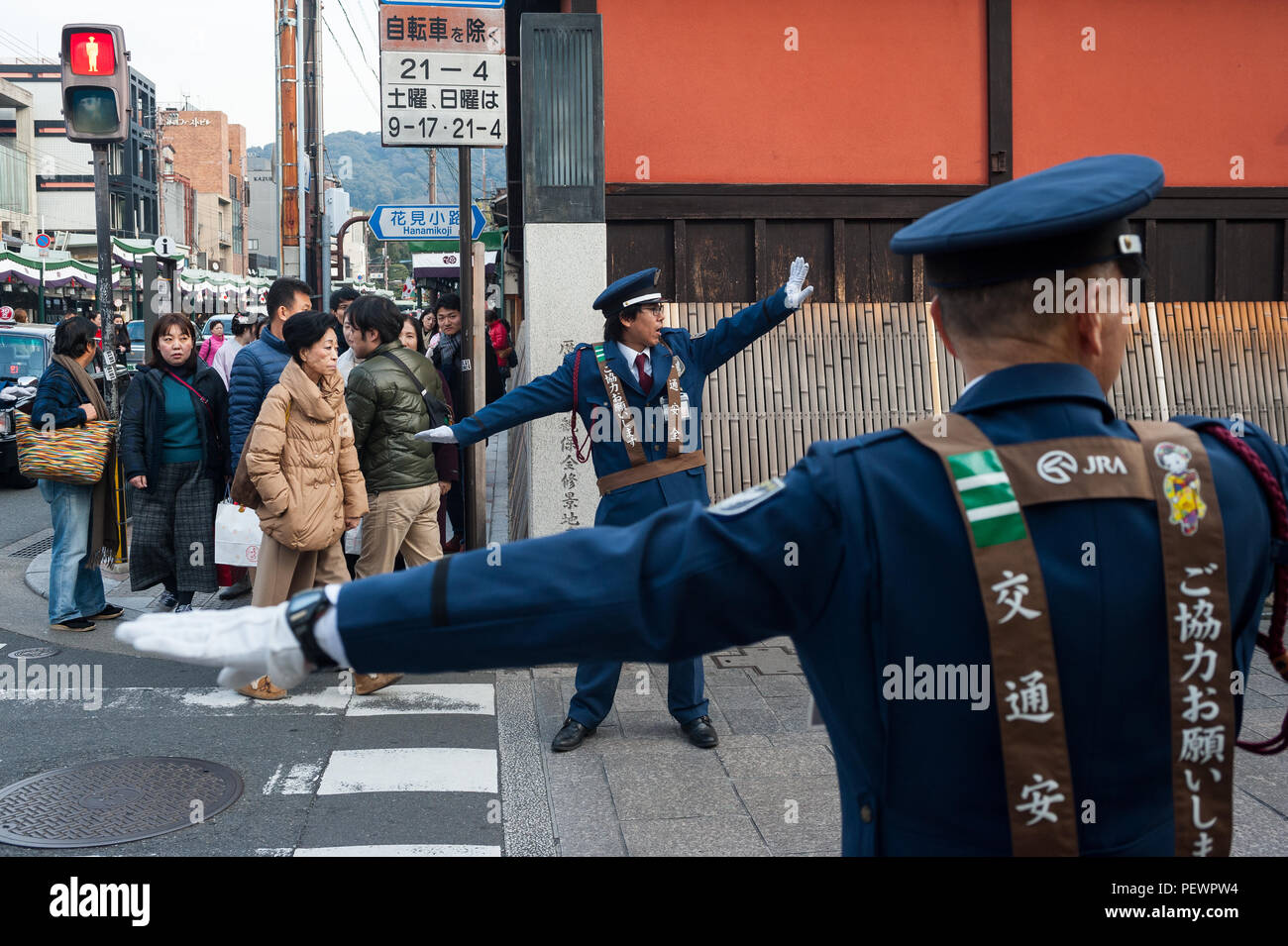 23.12.2017, Kyoto, Japan, Asia - Traffic wardens are seen regulating ...
