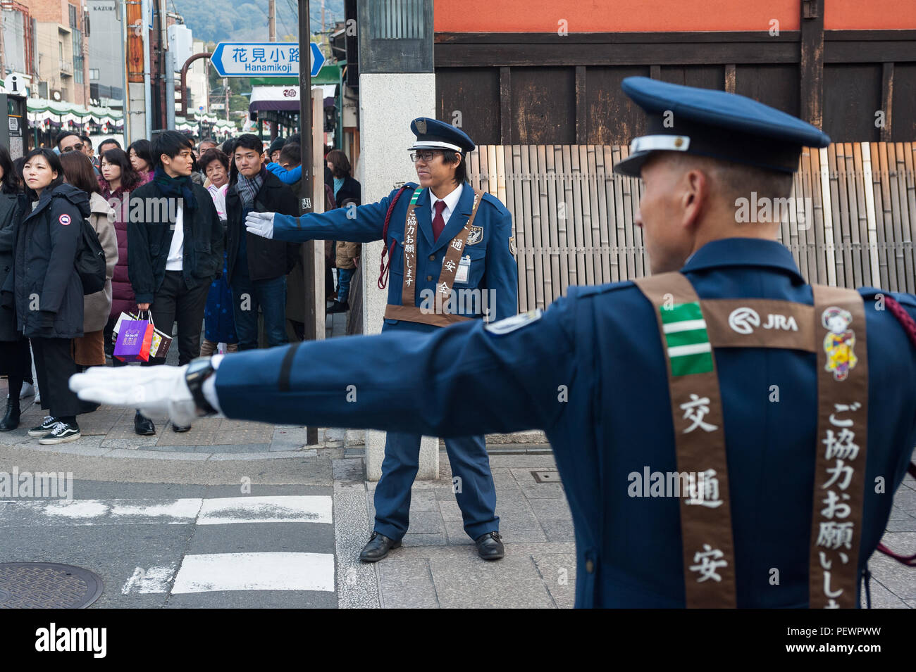23.12.2017, Kyoto, Japan, Asia - Traffic wardens are seen regulating ...