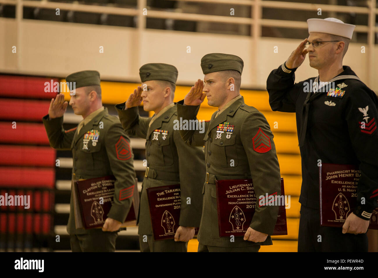 The Marine and sailor awardees salute Maj. Gen. Brian D. Beaudreault ...