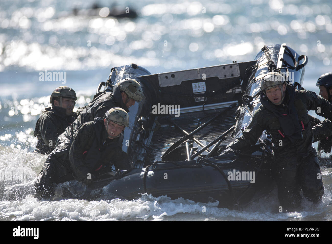 Japan Ground Self-Defense Force soldiers conduct a beach reconnaissance ...