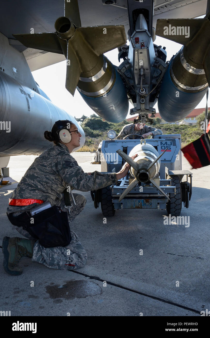 U.S. Air Force Staff Sgt. Faith Olson, a weapons load crew chief ...