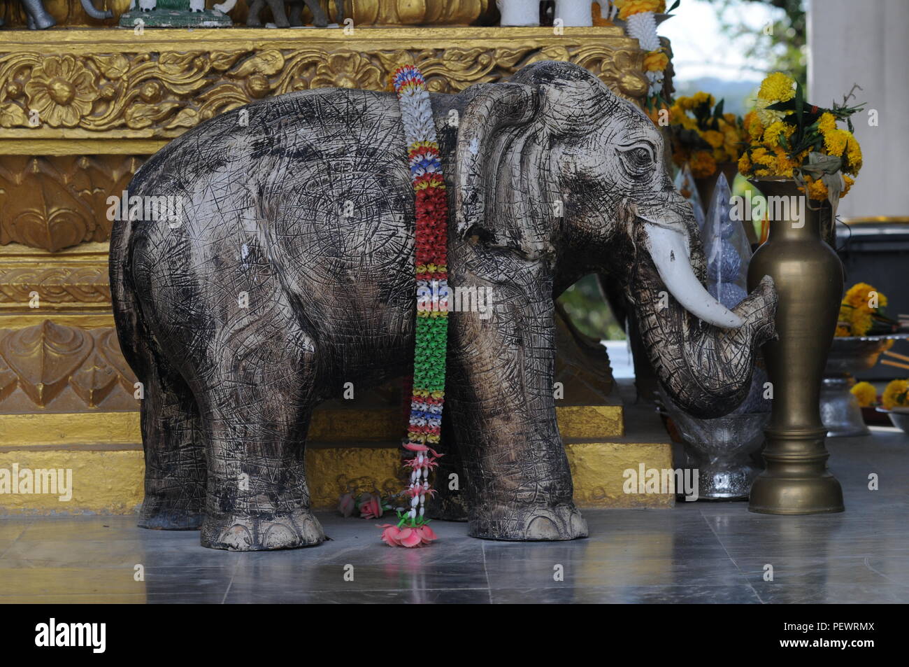 Sacred elephant statue in a small temple, Pha-Mo-E-Dang Cliff, Khao ...