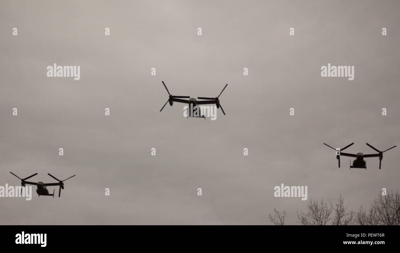 MV-22B Ospreys fly over Quantico National Cemetery during a ceremony to ...