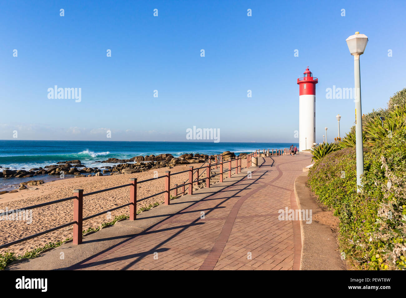 Beach Ocean Lighthouse walking promenade scenic holiday landscape Stock ...
