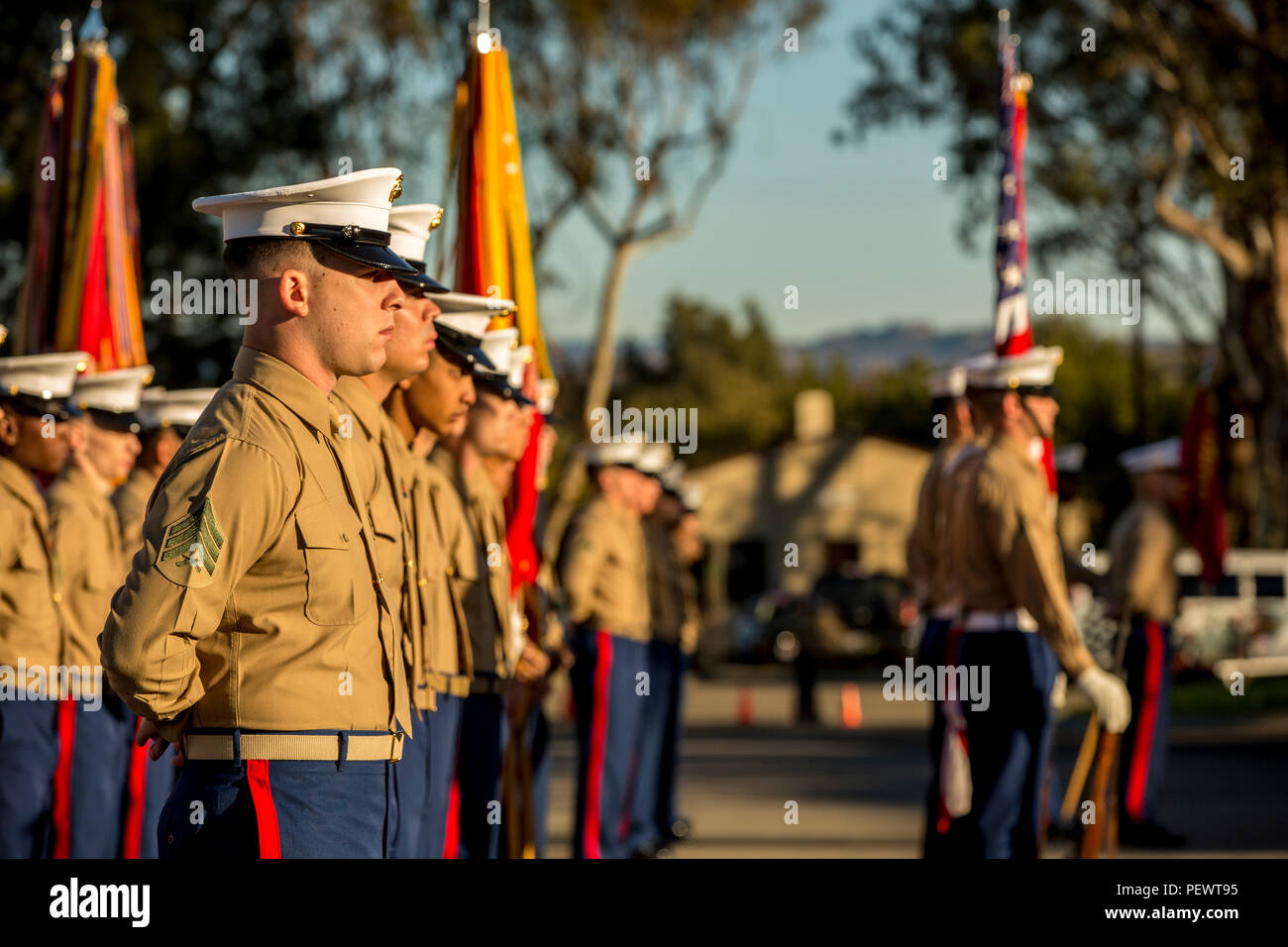 U.S. Marines stand at parade rest during a morning colors ceremony on ...
