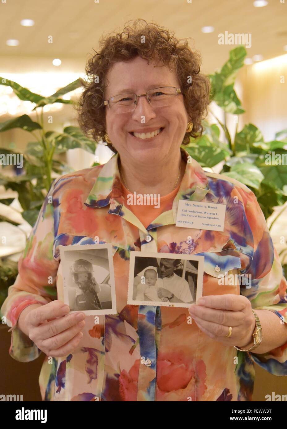 Natalie Anderson Rauch holds photos of her father, Col. Warren Anderson ...