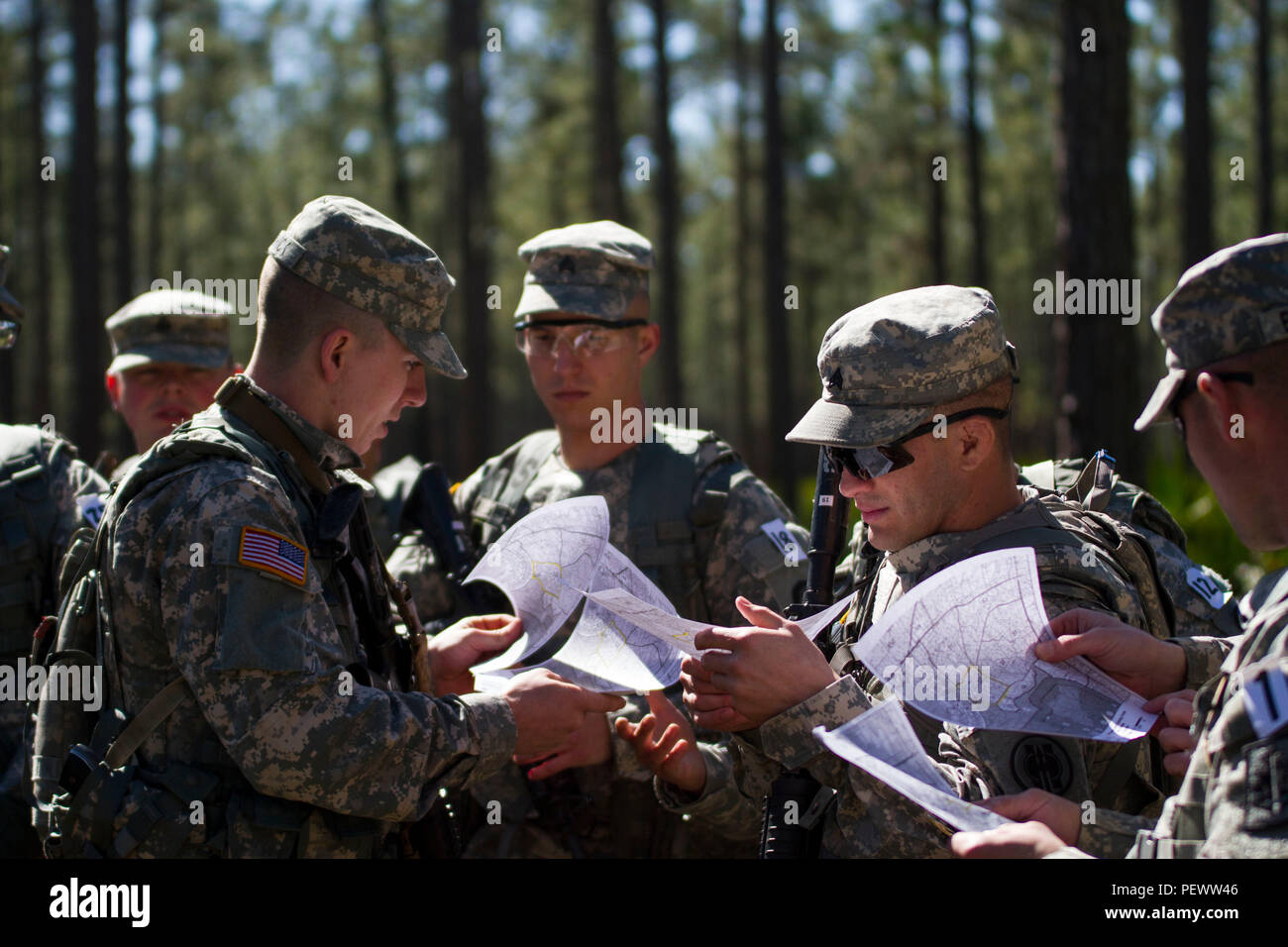 U.S. Army Reserve military police Soldiers receive maps of a land ...