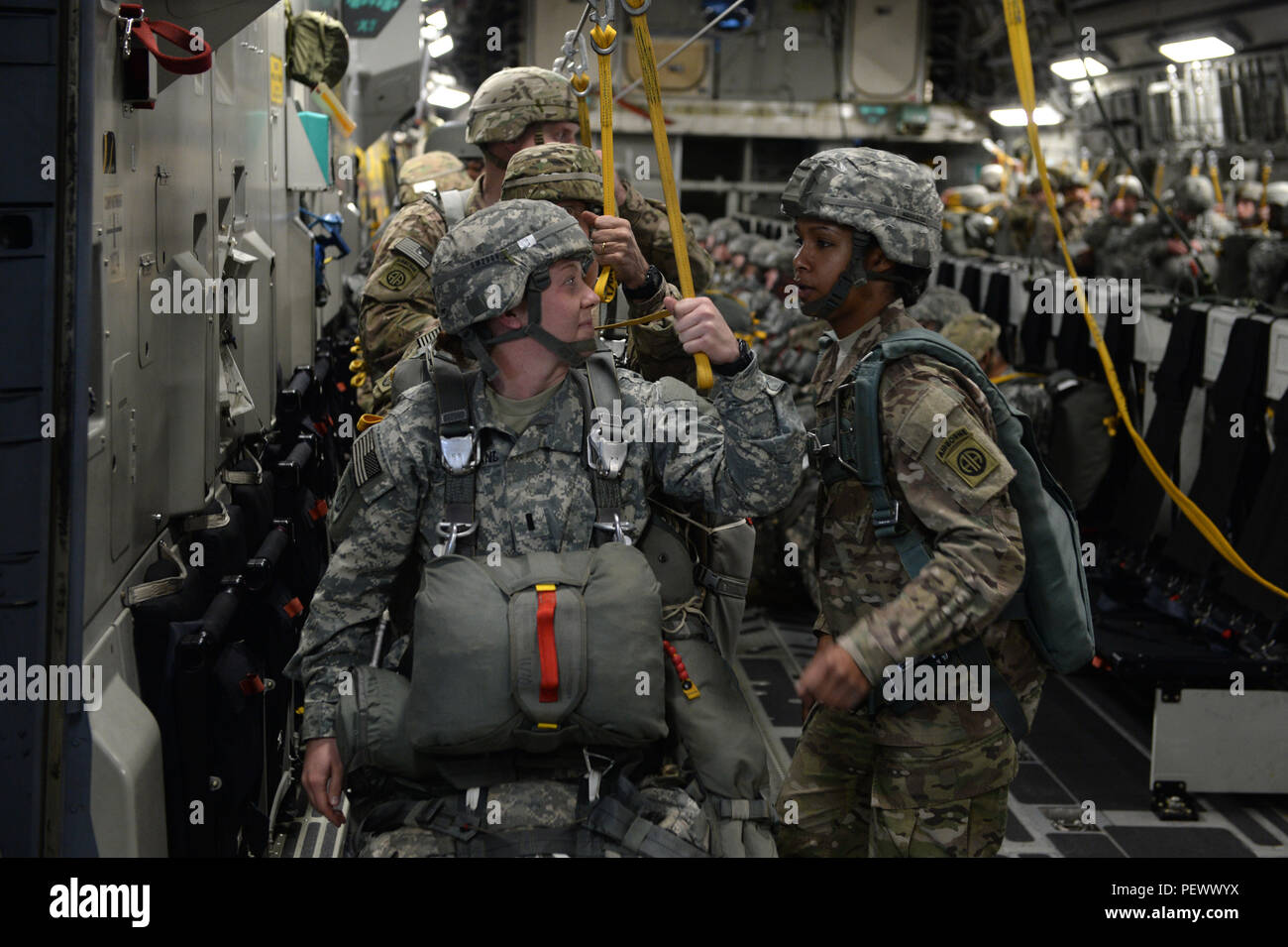 U.S. Army members from the 82nd Airborne Division prepare to jump on ...