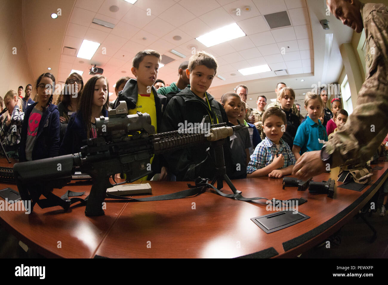 Children learn about U.S. Special Forces weapons and gear Feb. 5, 2016 ...