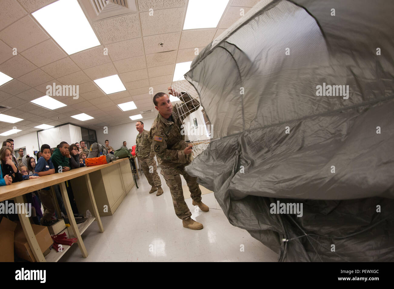 A U.S. Army rigger assigned to Special Operations Command South readies ...