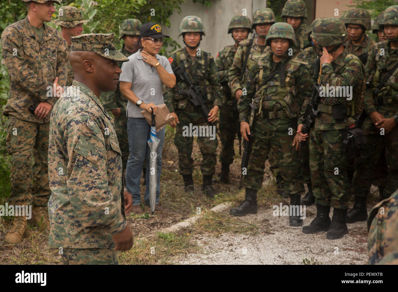U.S. Marine Corps Sgt. Maj. Mario Fields, left, sergeant major of 4th ...