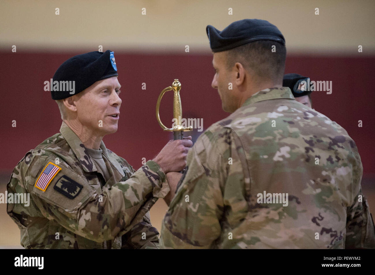 Command Sgt. Maj. Marc A. Gianotti, right, passes the noncommissioned ...