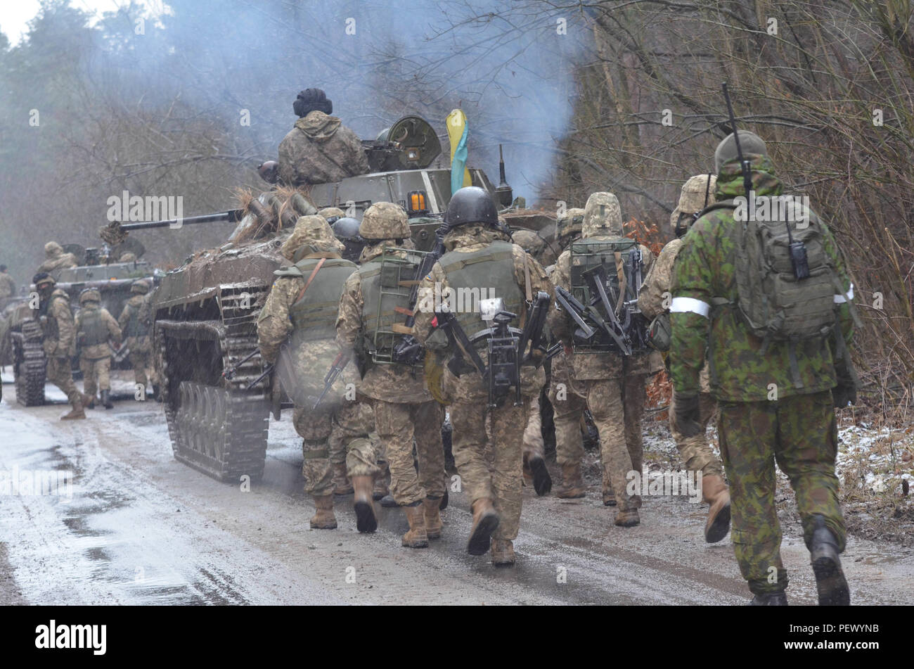 Soldiers with the Ukrainian army recon the perimeter and establish ...