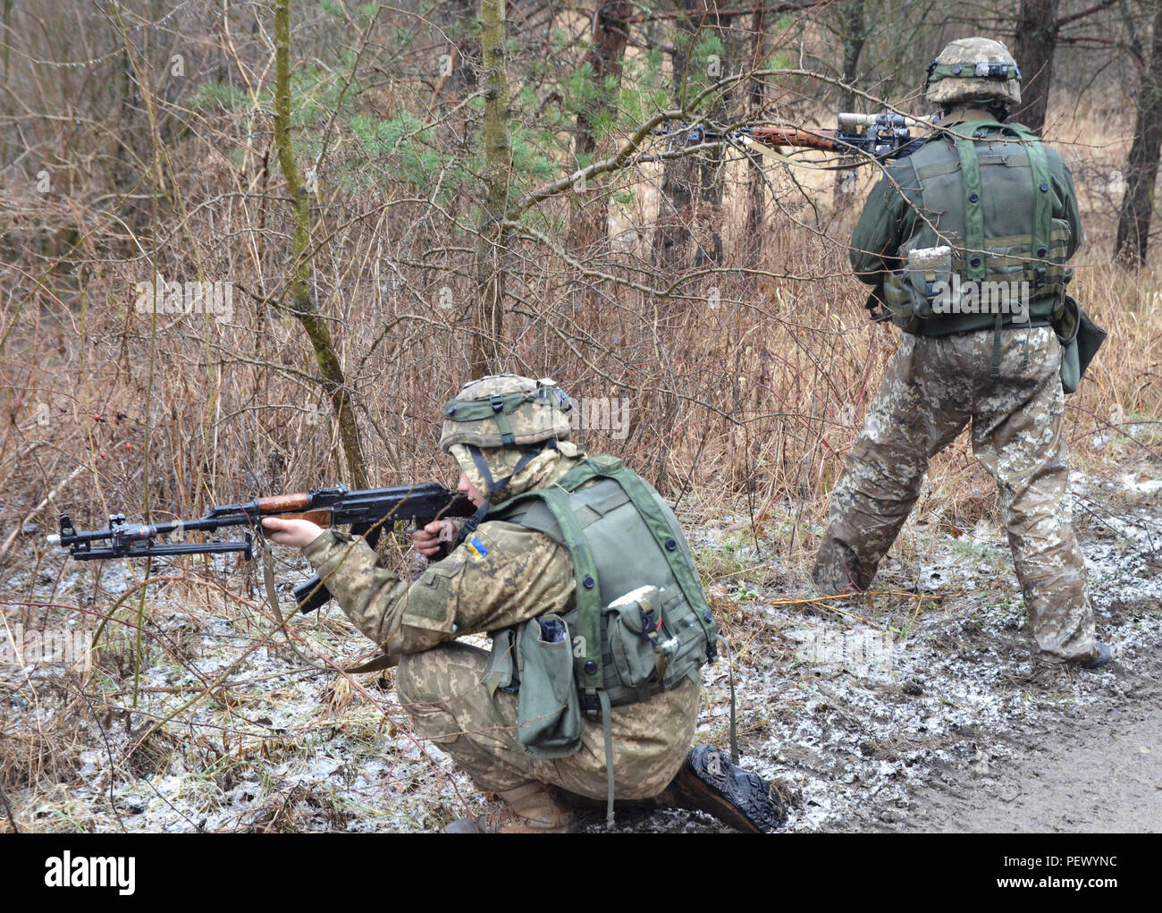 Soldiers with the Ukrainian army recon the perimeter and establish ...