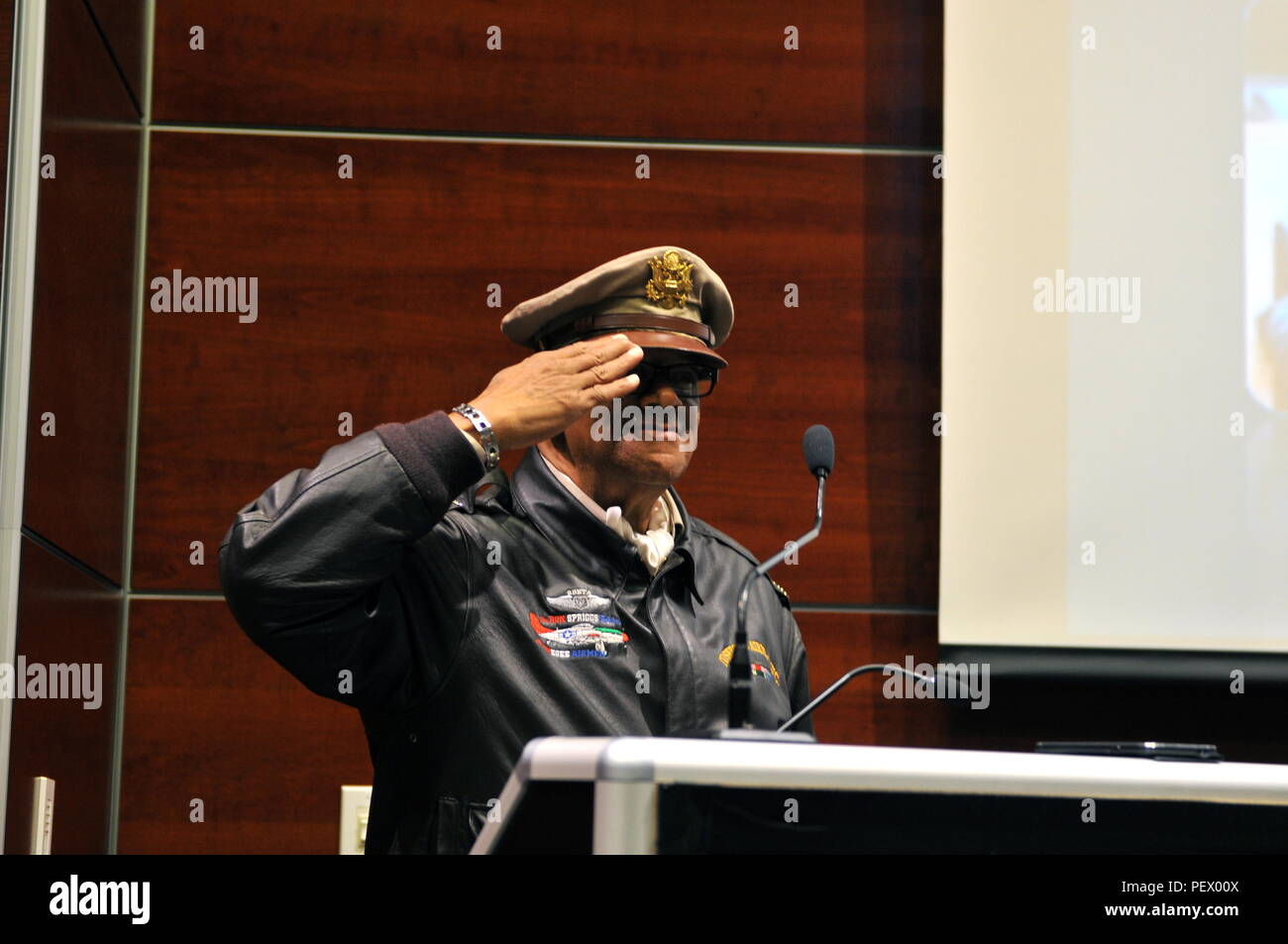 Donning an authentic Tuskegee Airmen cap, ‘Uncle’ Ron Spriggs salutes ...