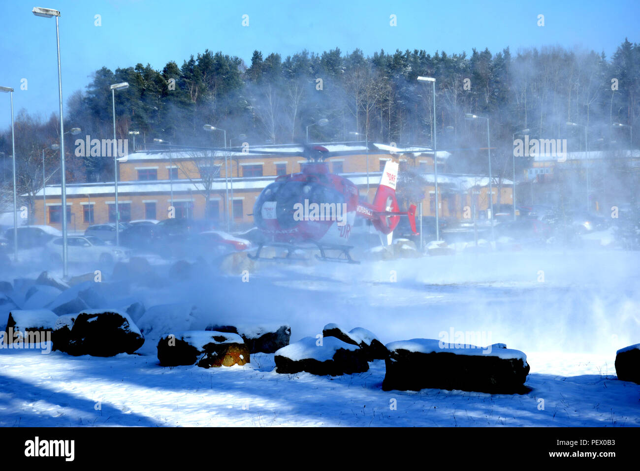 A Eurocopter EC 135 with the German Air Rescue Service lands in front ...