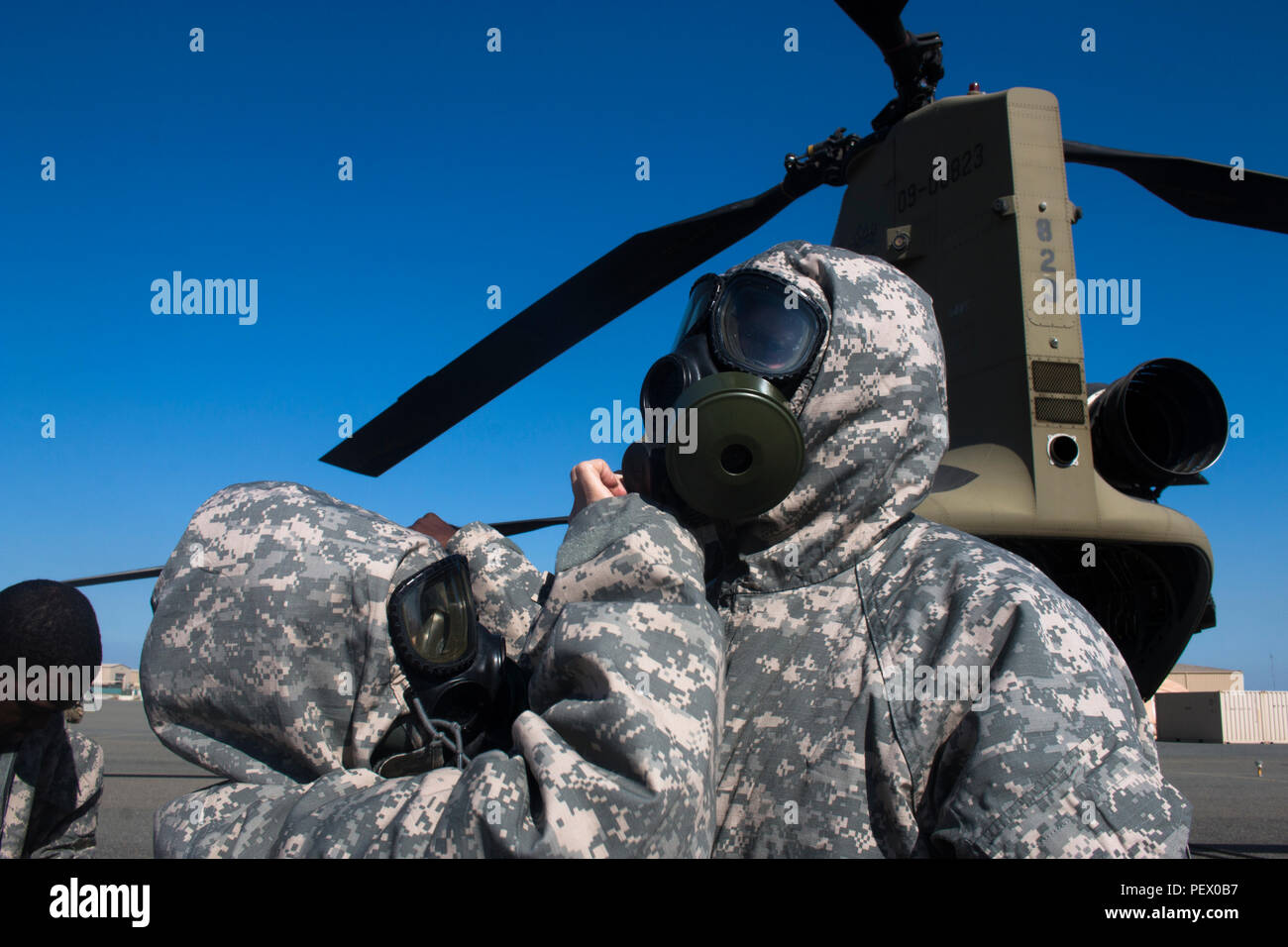 Army Reserve CBRN specialists conduct protective mask adjustments ...