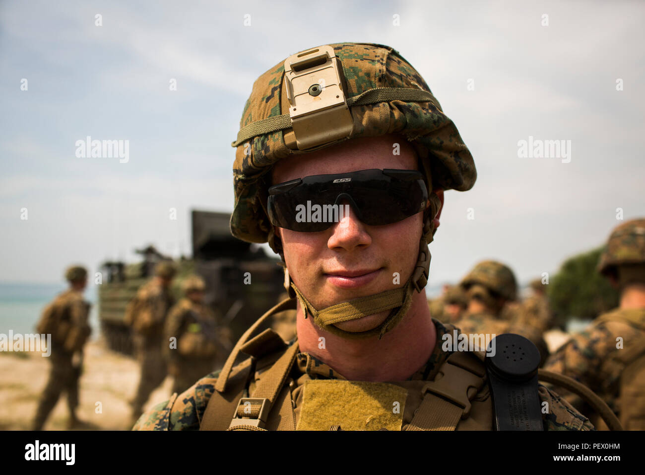 A U.S. Marine poses for a photograph during an amphibious capabilities ...