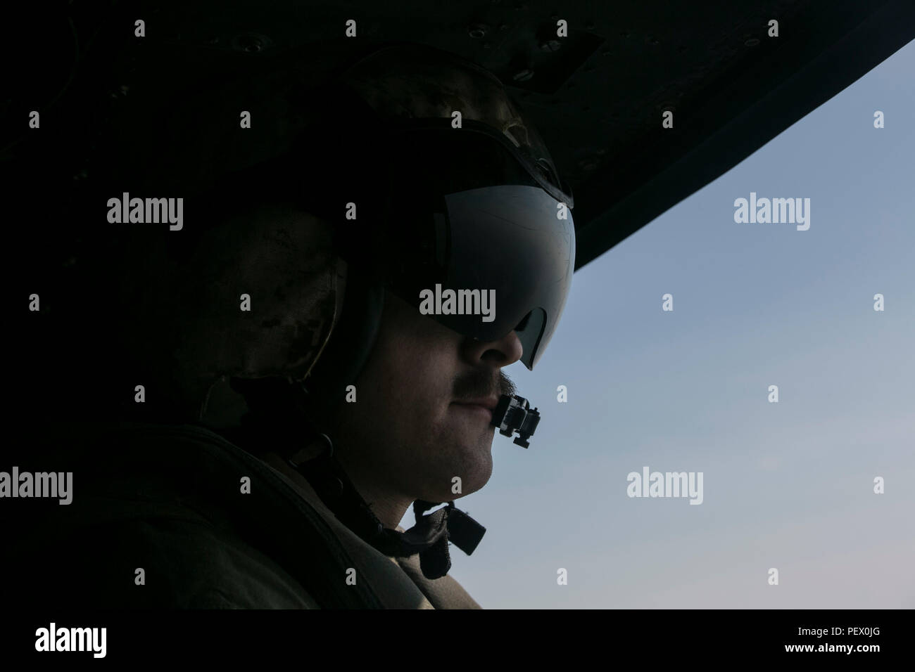Cpl. Erik A. Dudley scans the horizon as naval and air assets support ...