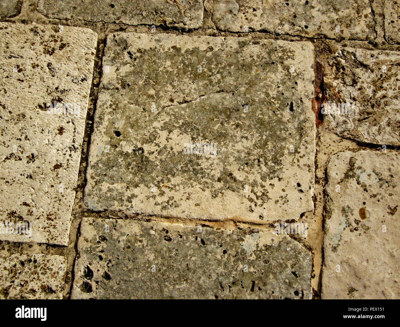 Old stone pavement and wall Stock Photo - Alamy