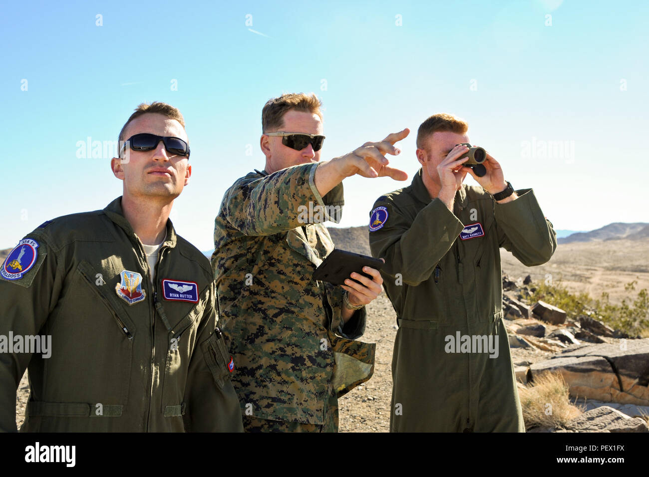 U.S. Air Force Capt. Ryan Rutter, left, Capt. Mathew C. Barrett, right ...