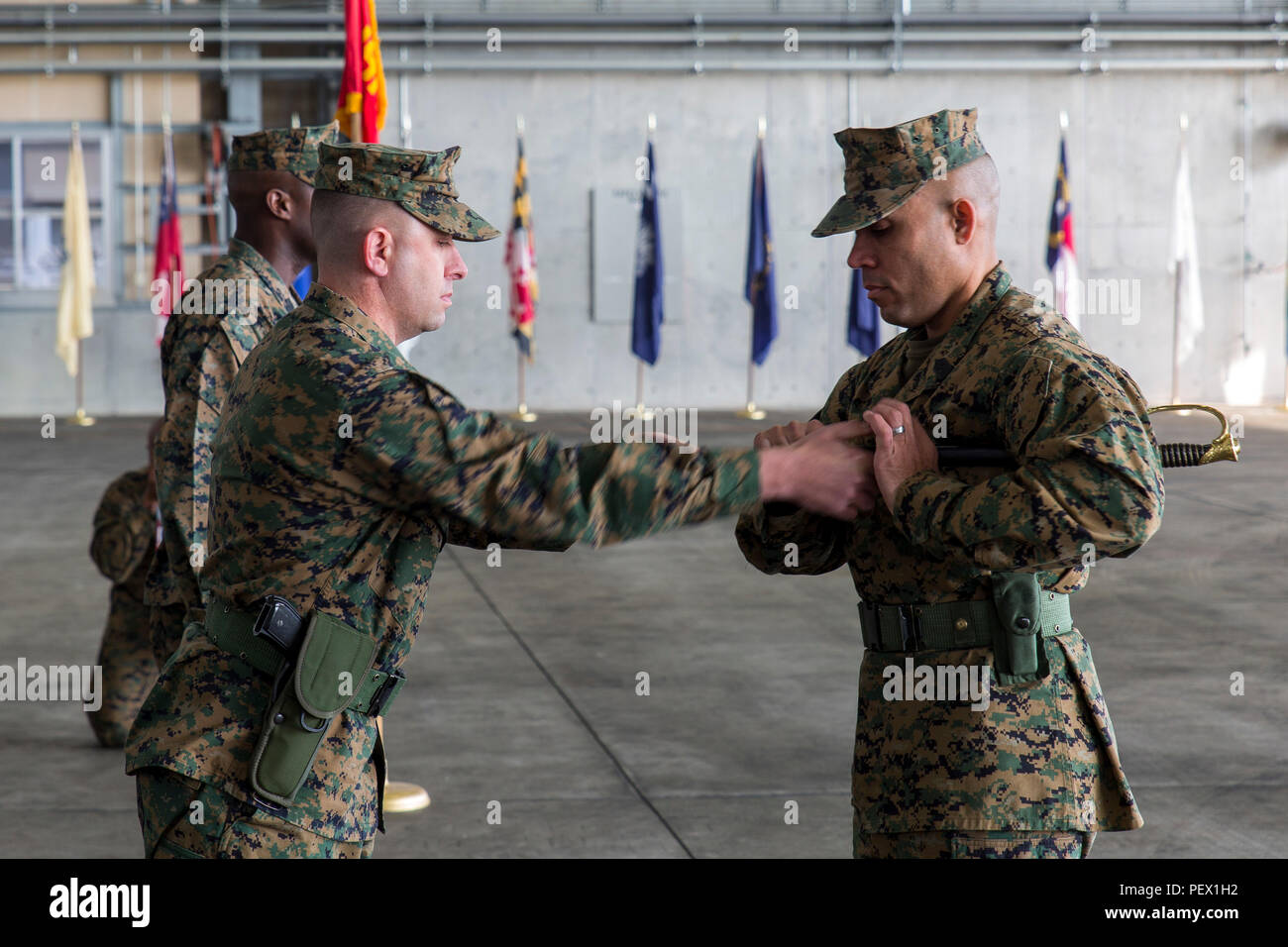 Lt. Col. Kolter Miller, left, Marine Aviation Logistics Squadron 12 ...