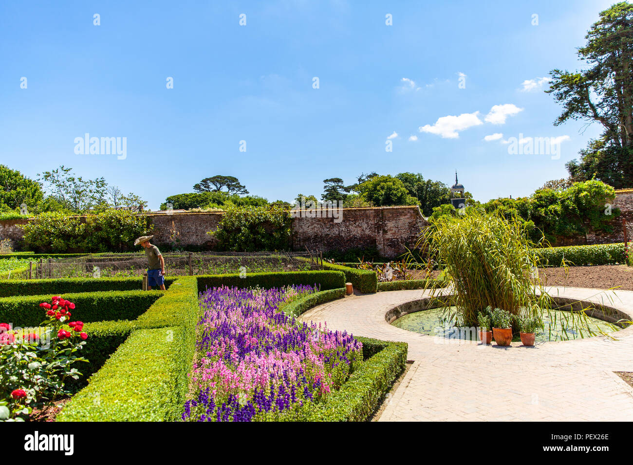 gardener in the landscaping at the Lost Gardens of Heligan attractions ...