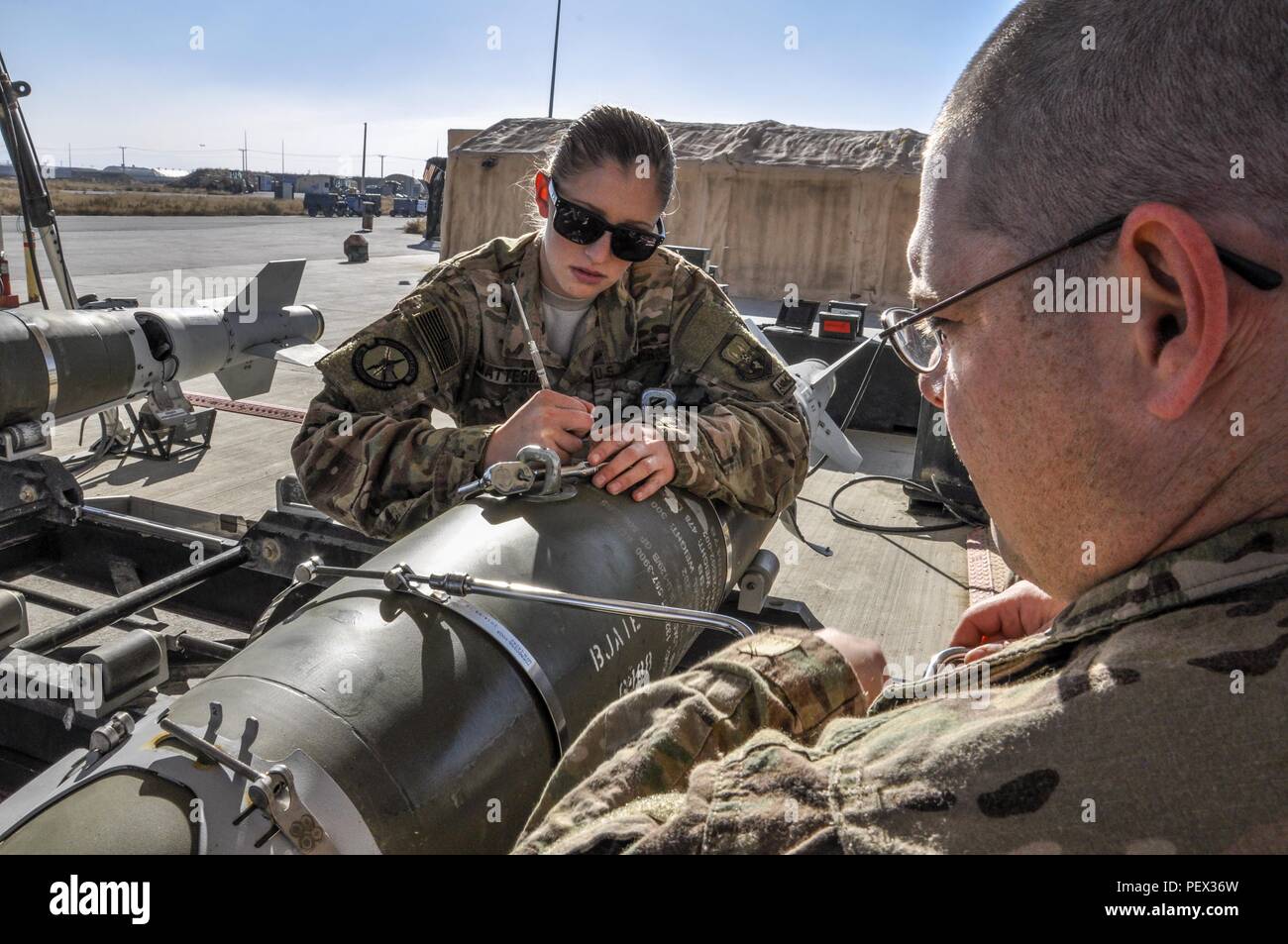 Staff Sgt. Samuel Percy and Airman Morgan Matteson, both from the 455th ...