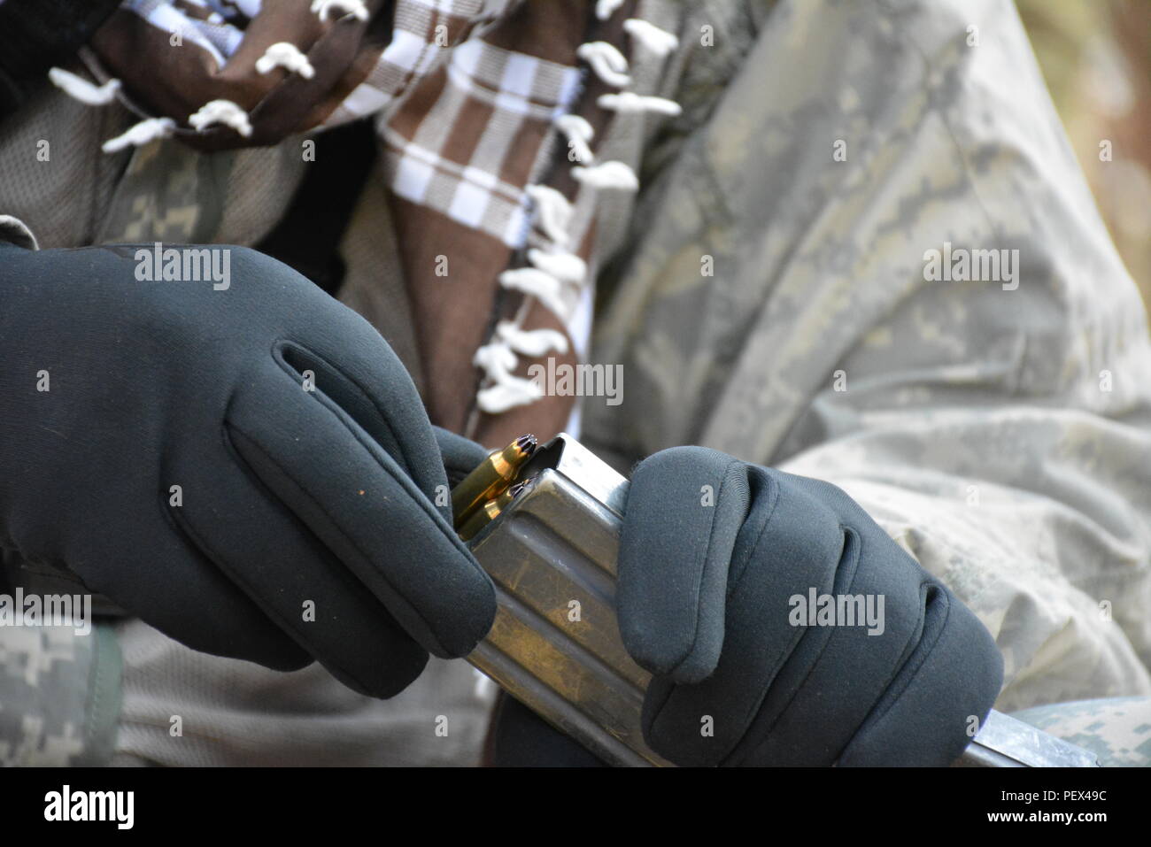 A member of the opposing force prepares to engage the soldiers ...