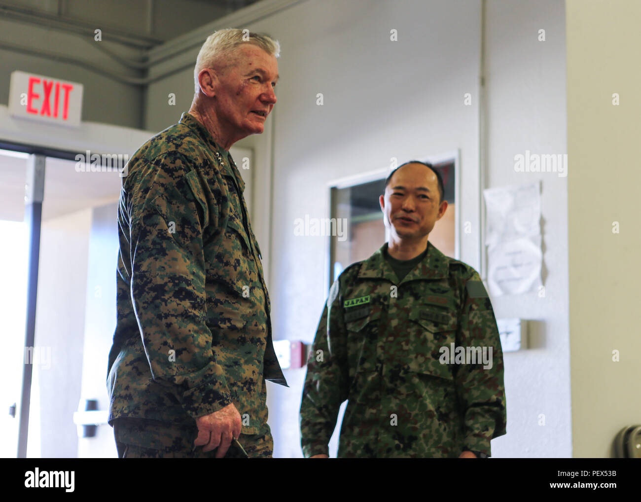 U.S. Marine Lt. Gen. John A. Toolan greets Maj. Gen. Shinichi Aoki ...