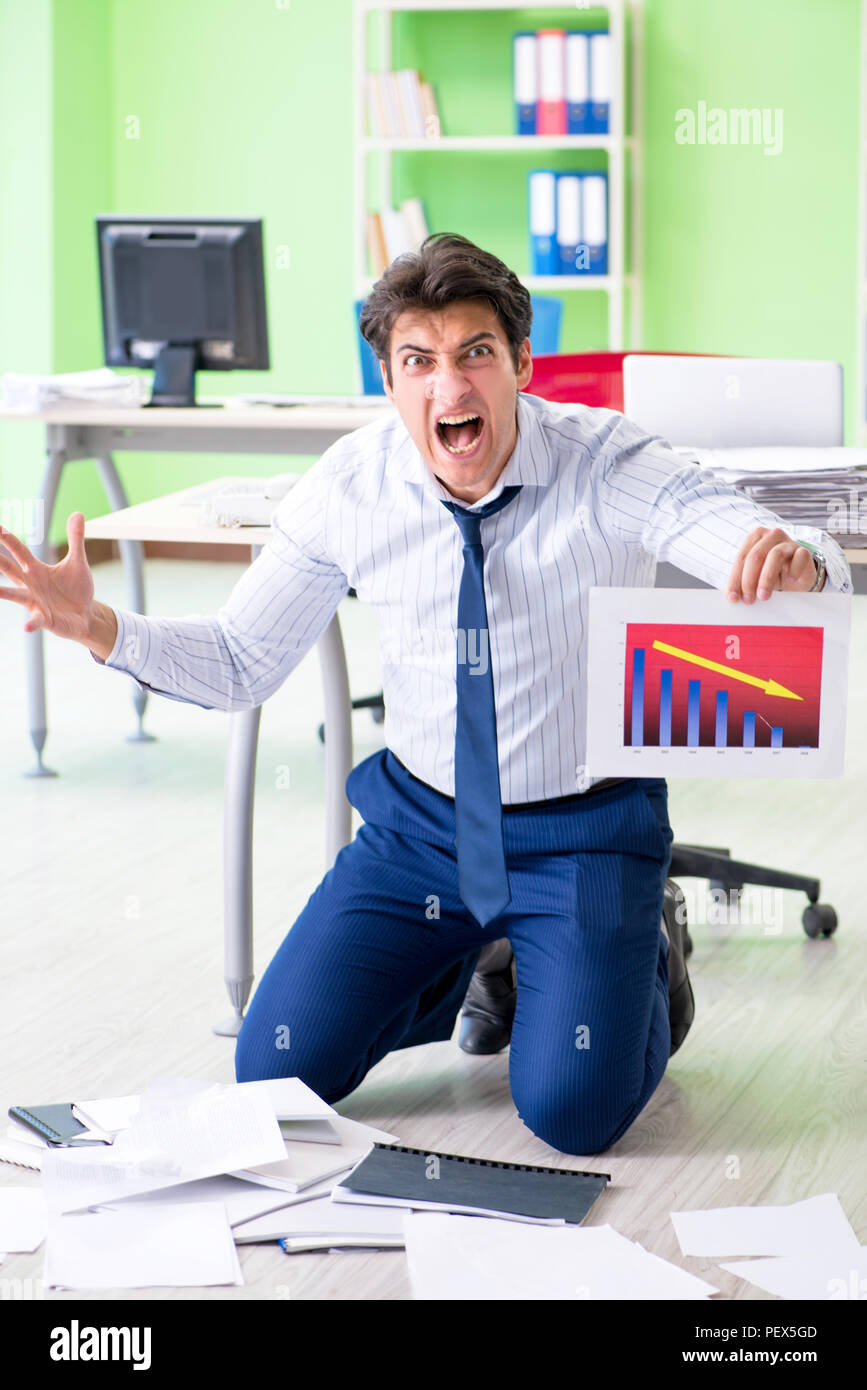 Frustrated businessman stressed from excessive work Stock Photo - Alamy