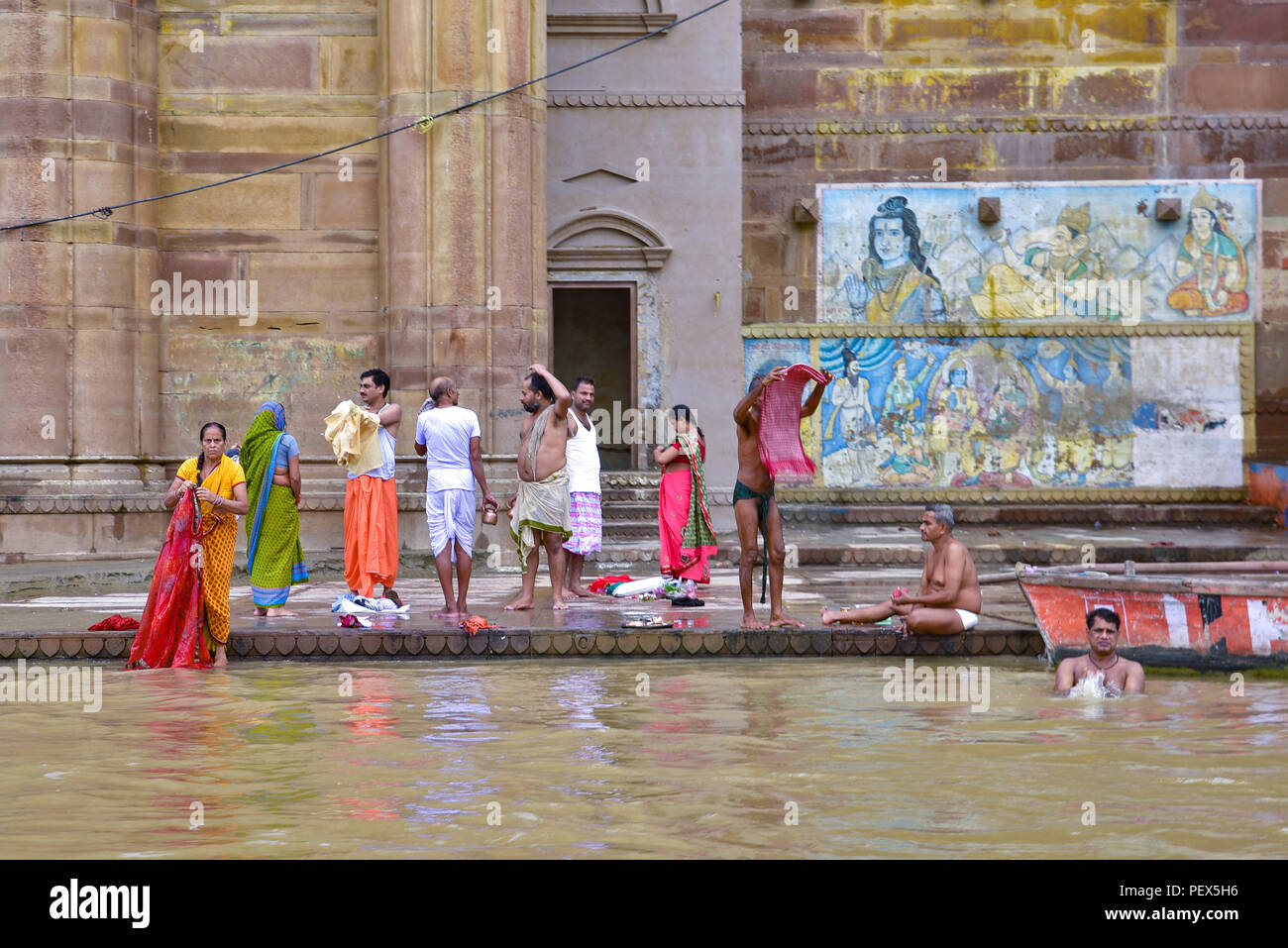 Hindu Indian pilgrims bathing and praying in Ganges river Stock Photo ...