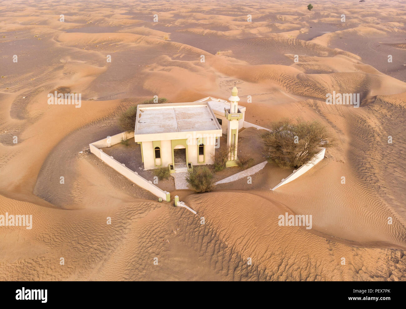 abandoned mosque in a desert, being overtaken by sand Stock Photo - Alamy