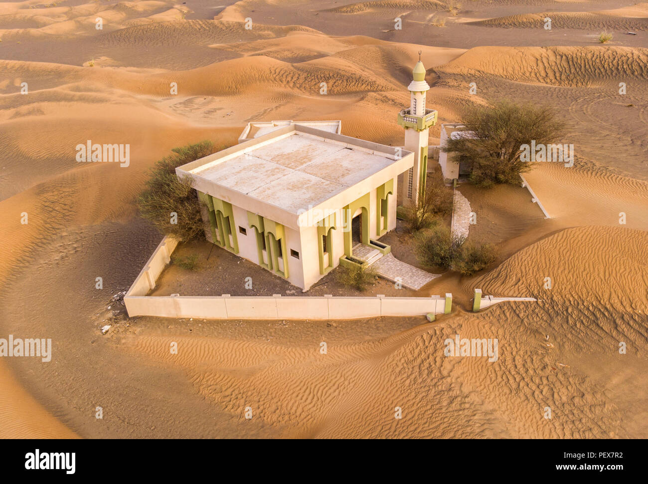 abandoned mosque in a desert, being overtaken by sand Stock Photo - Alamy