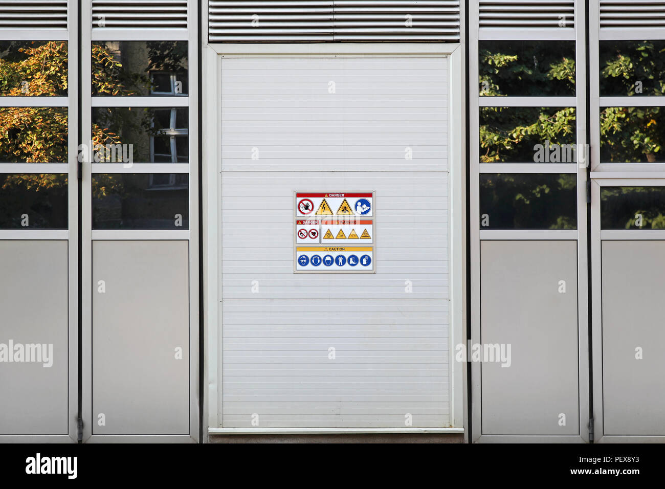 Big industrial garage door at factory exterior Stock Photo - Alamy