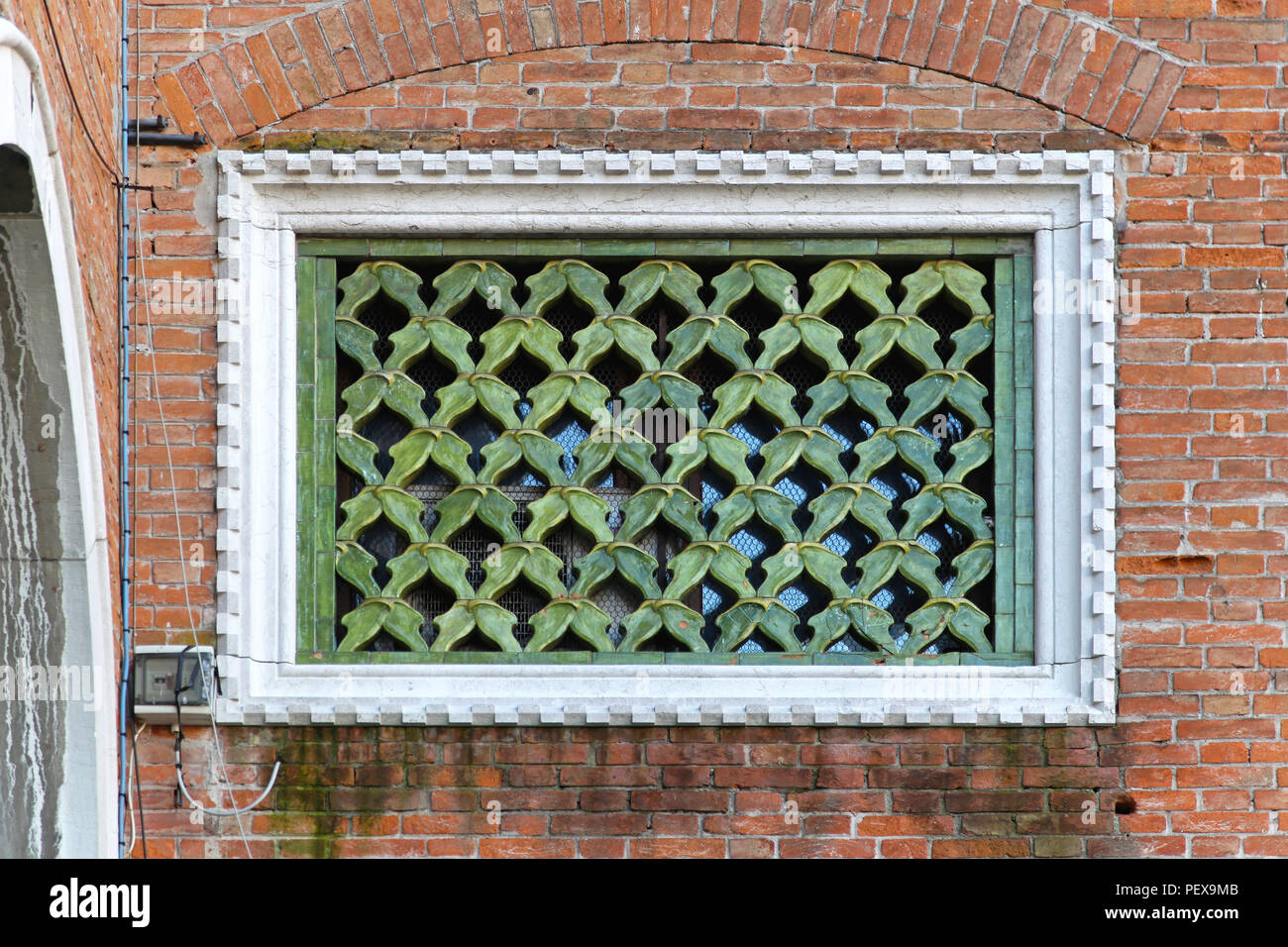 Medieval window with ceramic in Venice Stock Photo - Alamy