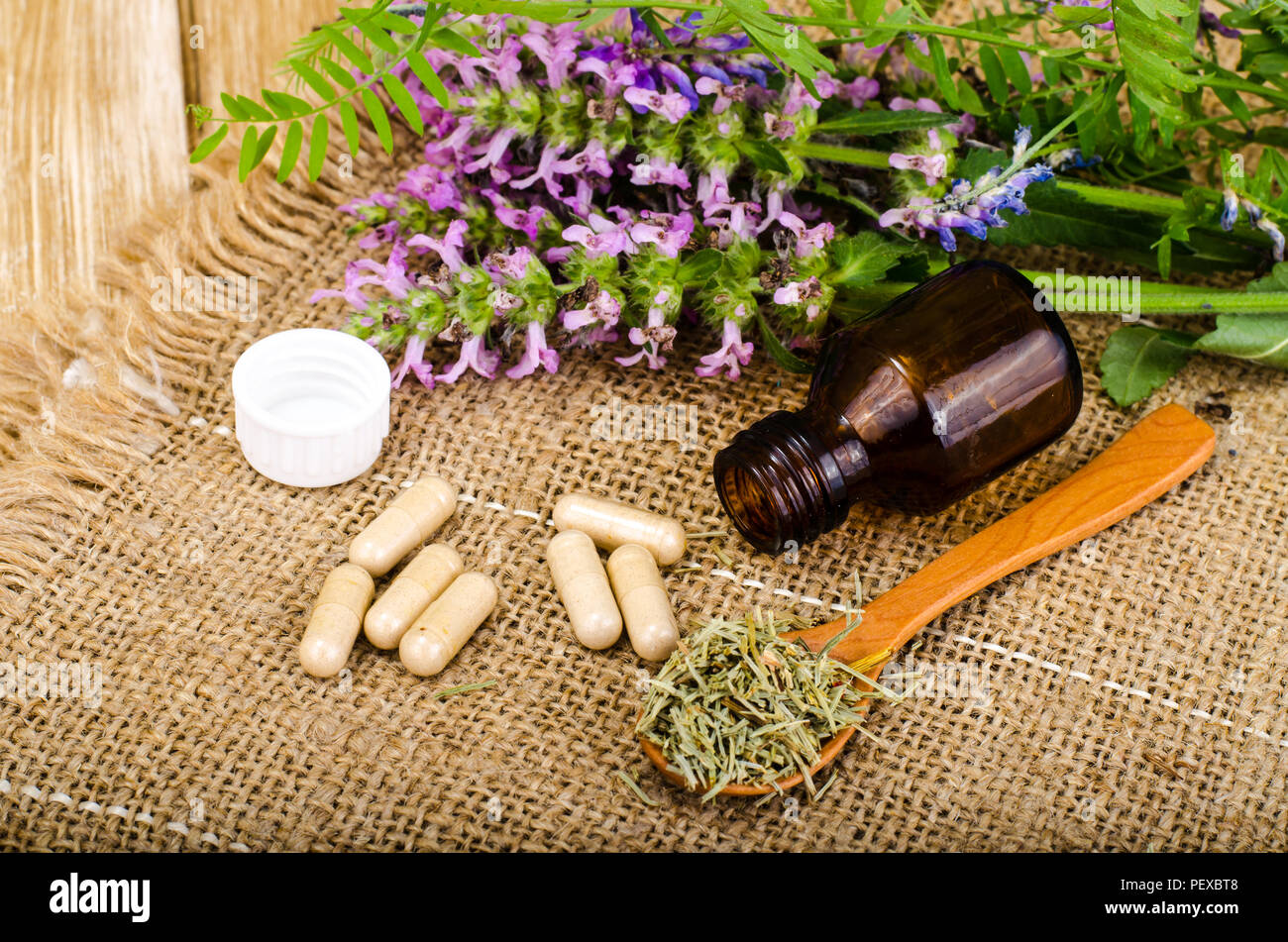 Natural herbal capsules from medicinal plants. Studio Photo Stock Photo ...