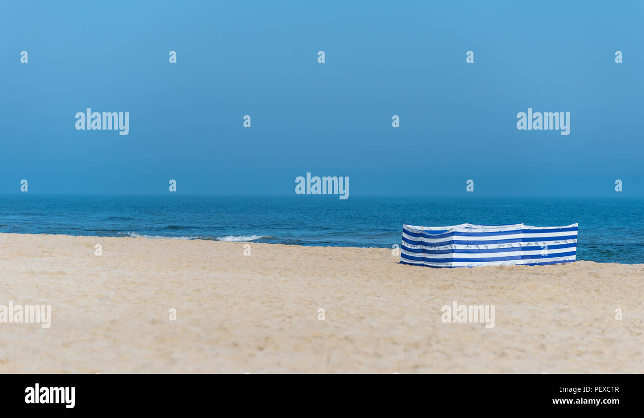 Beach screen on the Polish beach on a sunny summer day in the ...
